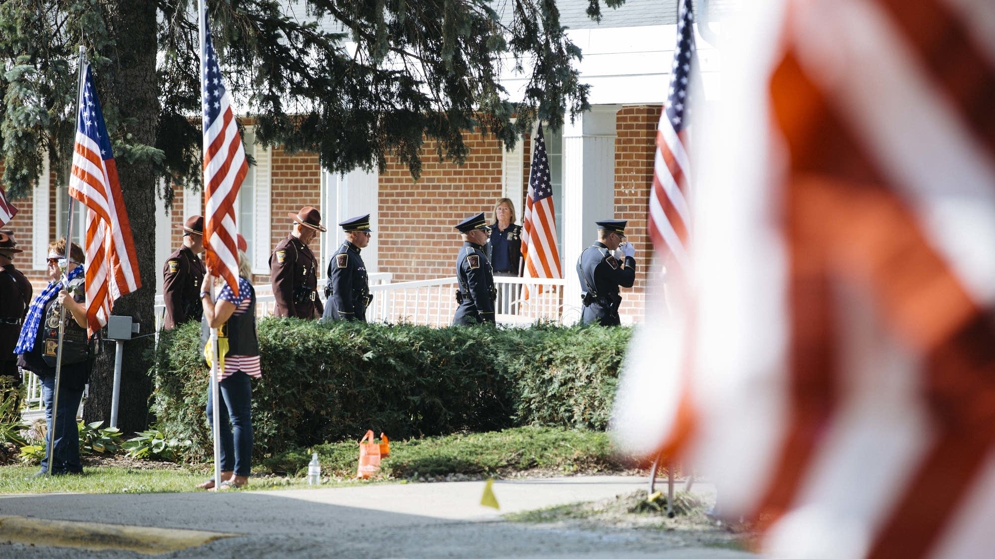 Law enforcement, citizens gather to honor officer Bill Mathews | MPR News