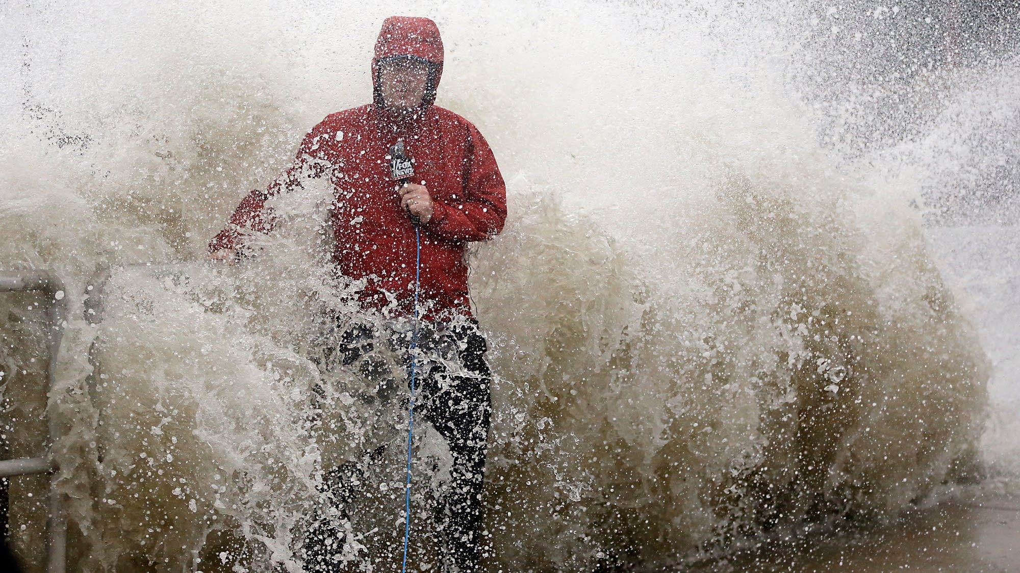 1,000 Words: More reporters standing in water | MPR News
