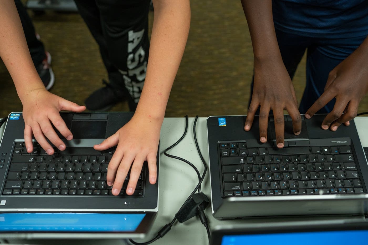 Students step in to refurbish computers as school needs rise | MPR News