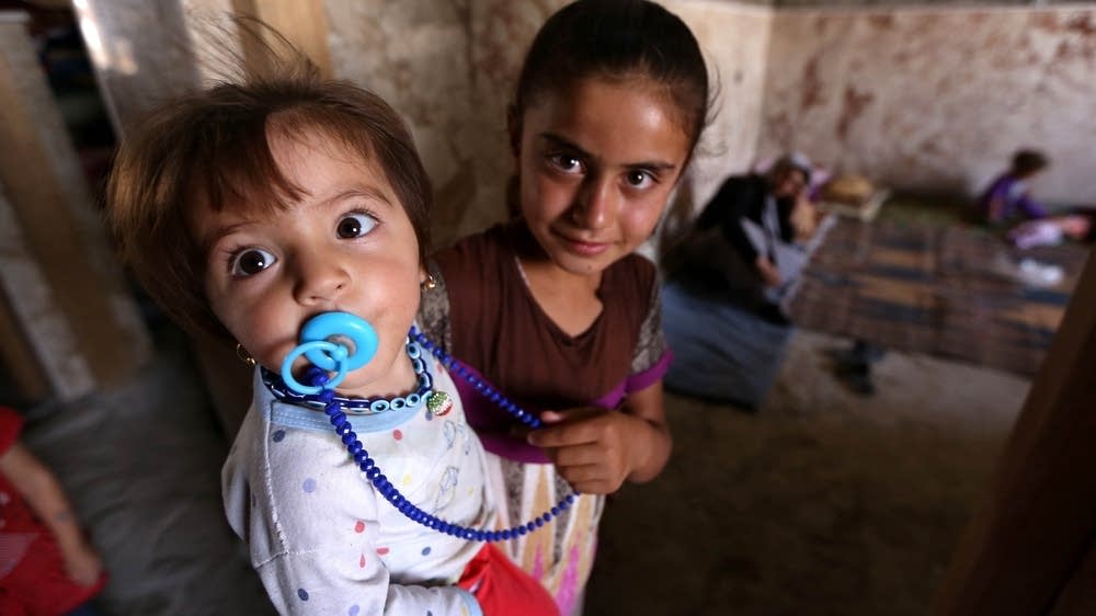 US weighs airstrikes, humanitarian aid in Iraq | MPR News