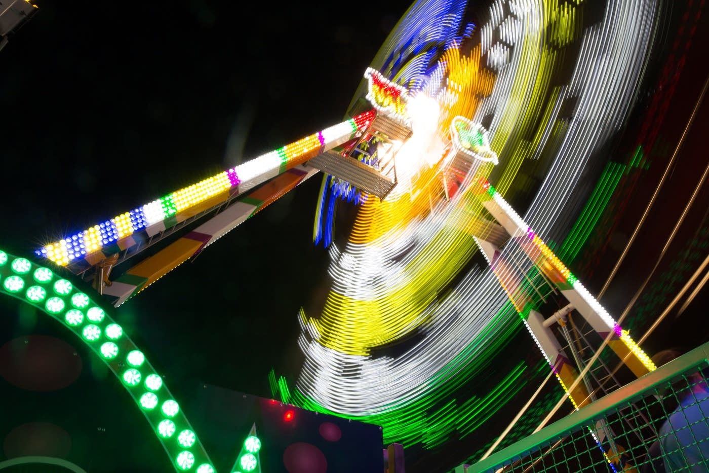 Photos: As afternoon fades to evening, the State Fair glows | MPR News