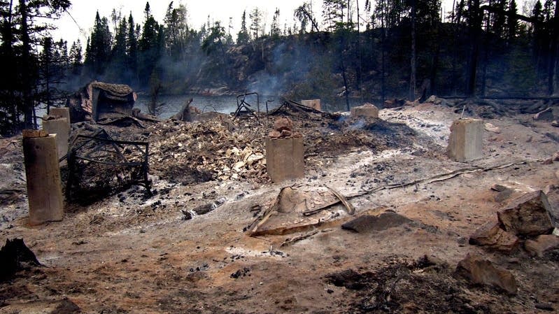 Back at the camp to clean up the damage | MPR News