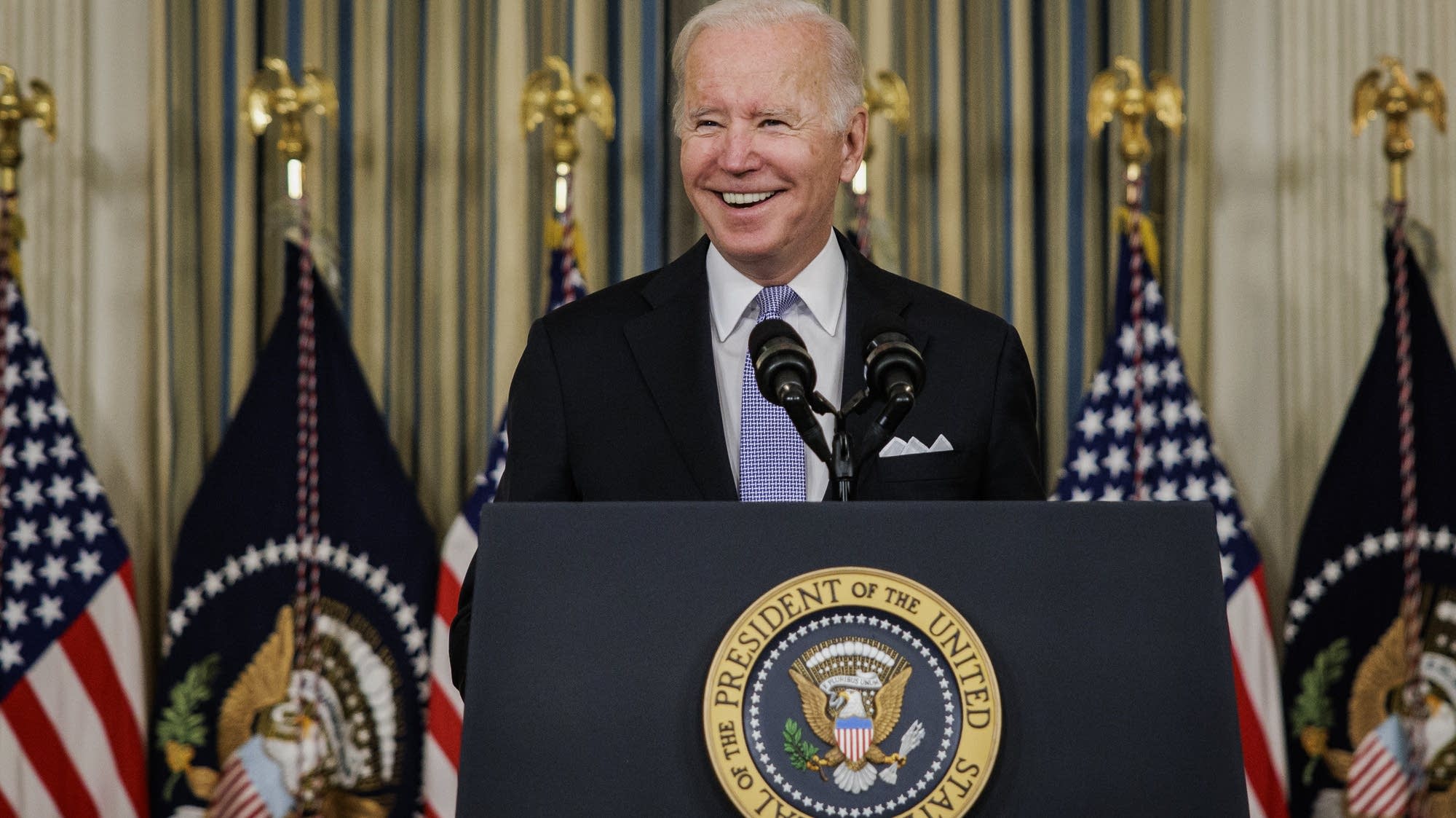 Biden hails infrastructure win as 'monumental step forward' | MPR News