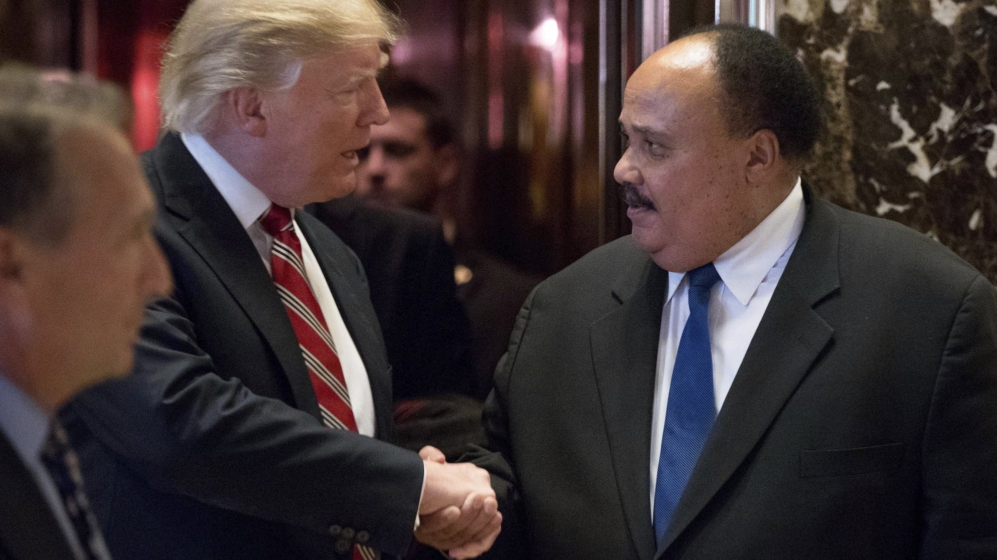 Trump tries to calm tensions after Lewis squabble | MPR News