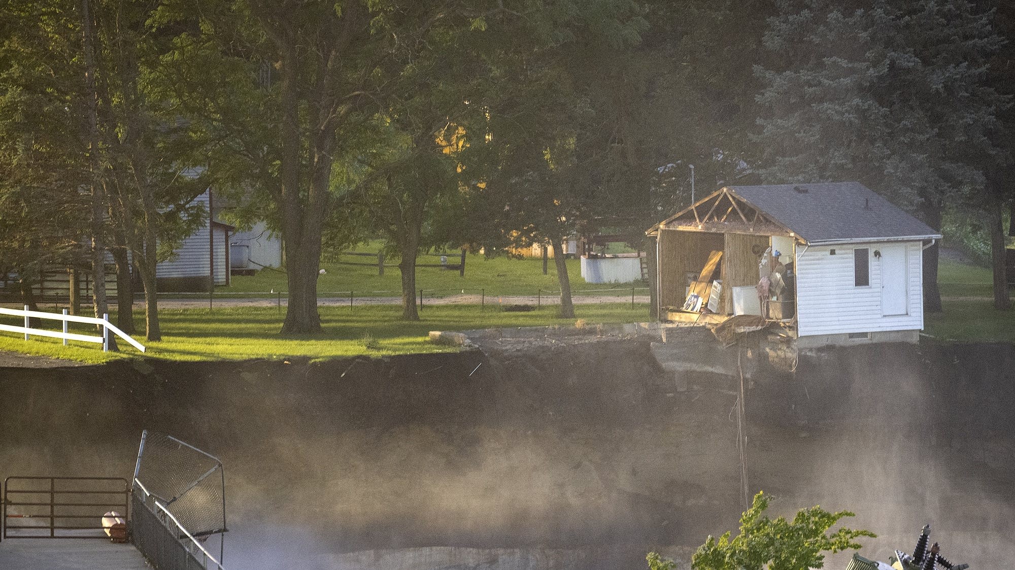 Erosion continues after rain-swollen Blue Earth River claims home near ...