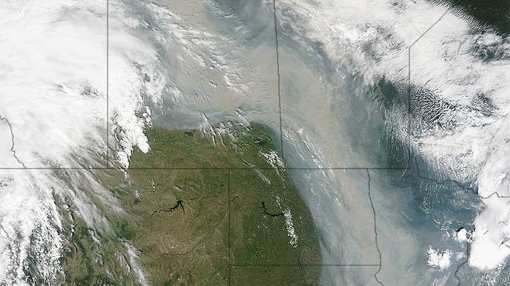 Fire and rain: Dense smoke plume follows downpours | MPR News