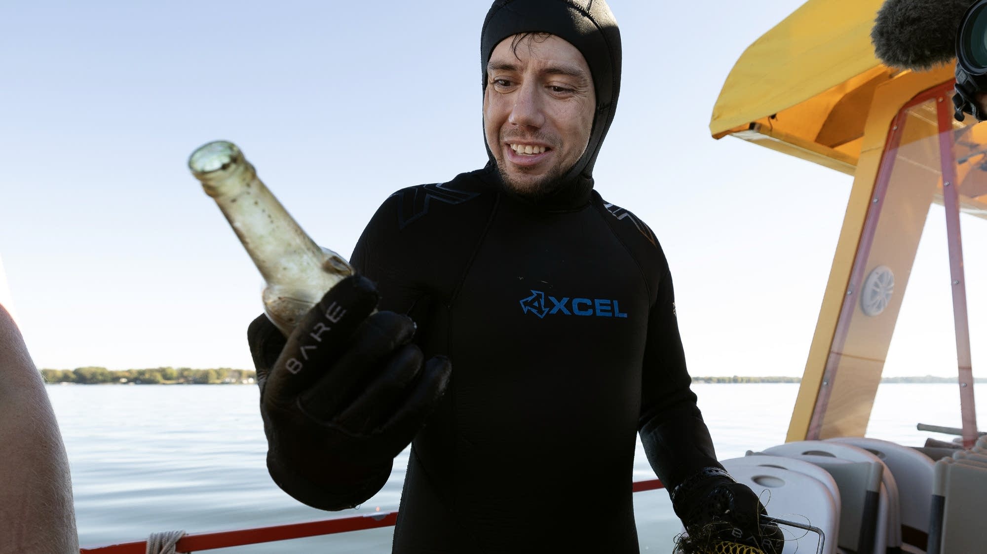 In Mille Lacs, divers go deep to uncover lake’s trash problem | MPR News