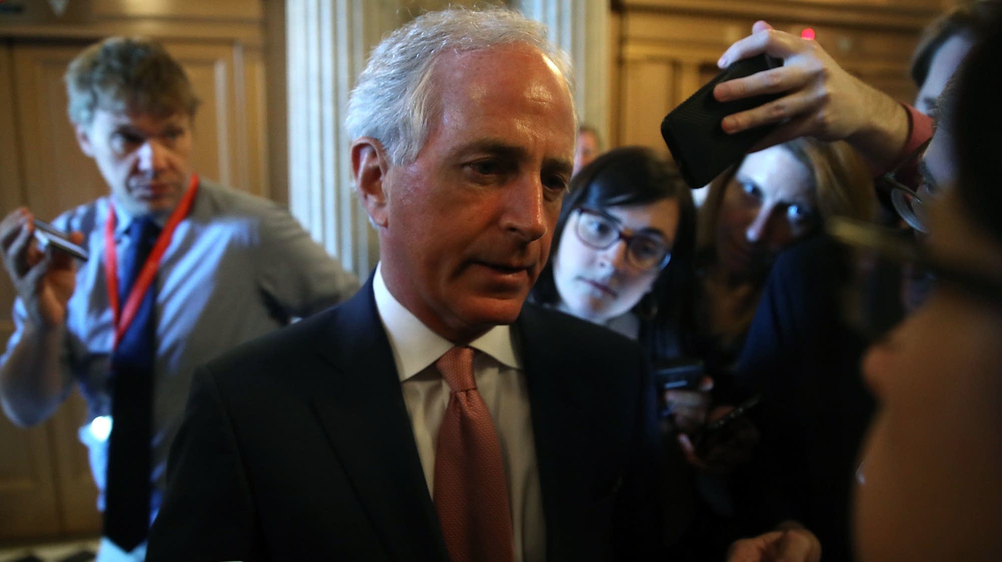 A striking row, even for Trump: New war of words with Corker | MPR News