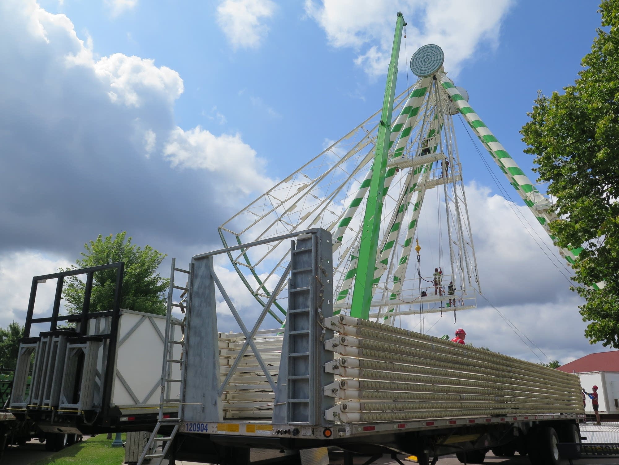Reinventing the wheel: As State Fair nears, giant ride rises again ...