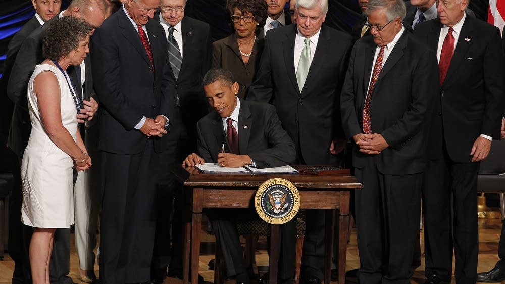 Obama signs sweeping financial overhaul into law | MPR News