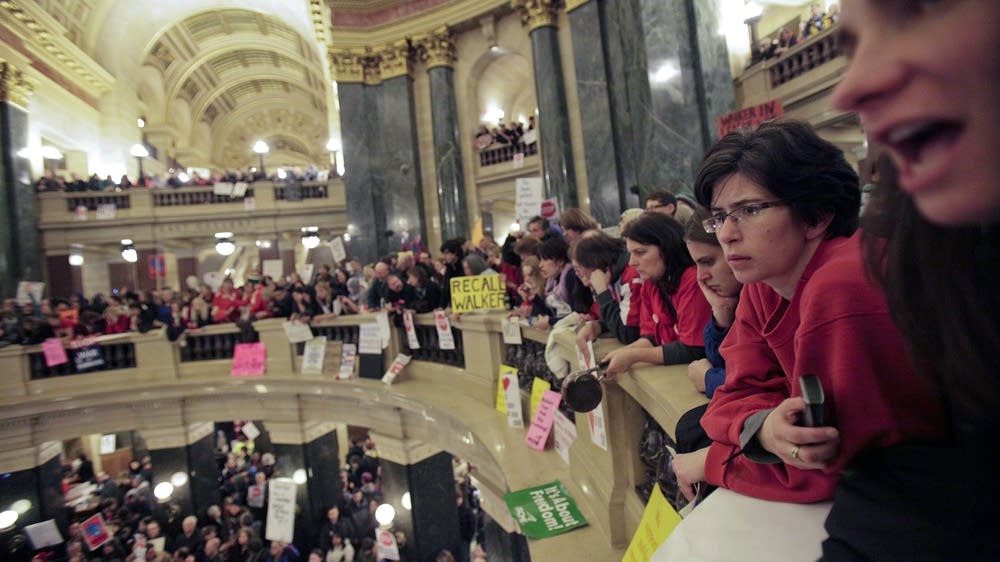 Protesters flood Wis. Capitol over anti-union vote | MPR News
