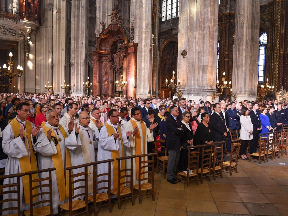 Paris Easter Mass honors firefighters who saved Notre Dame | MPR News