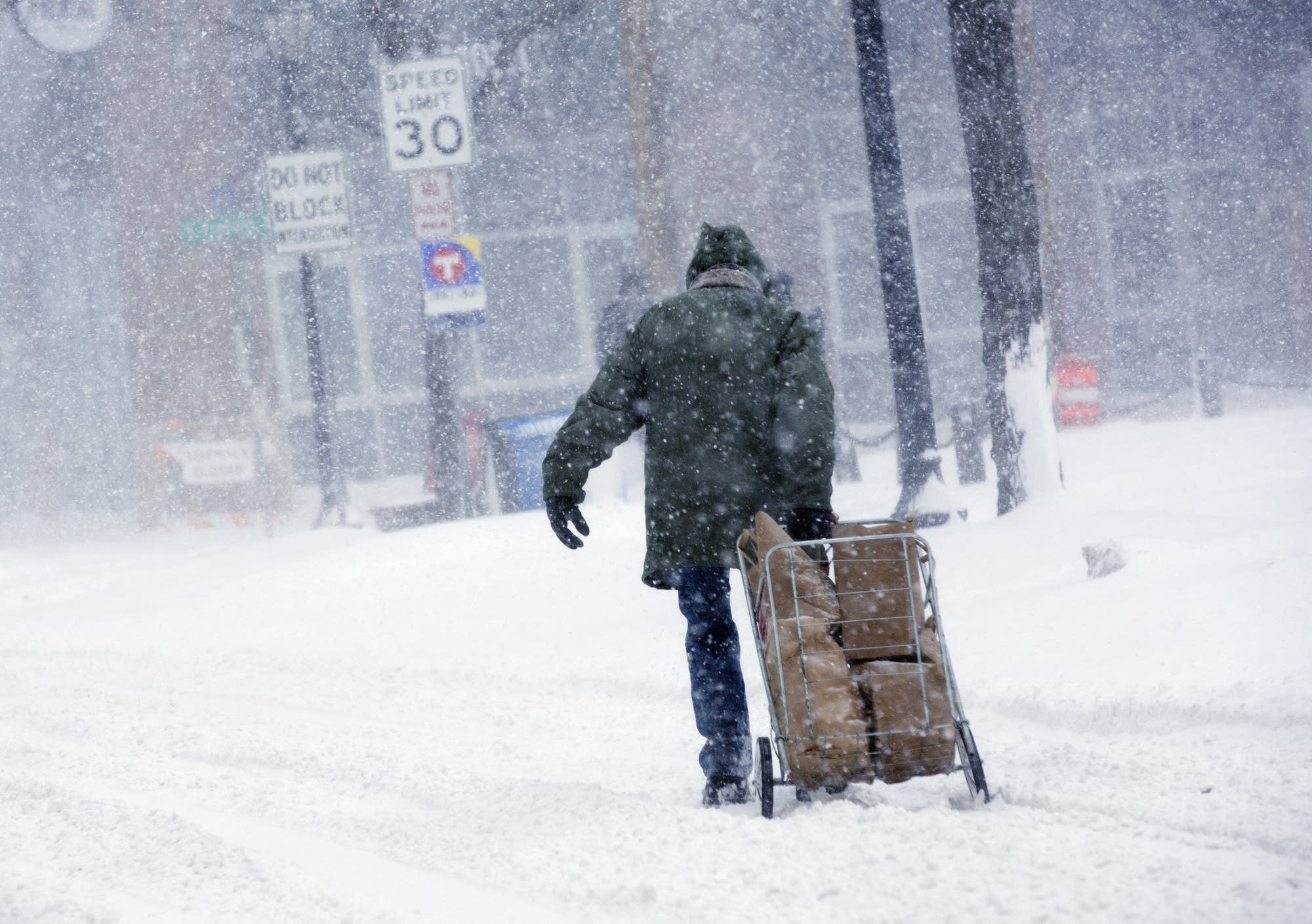 Photos: (Fool?)Hardy Minnesotans take on April blizzard | MPR News
