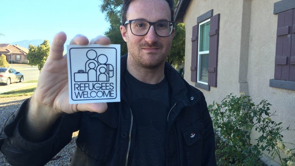 Mpls. print shop finds warm embrace for 'Refugees Welcome' stickers ...