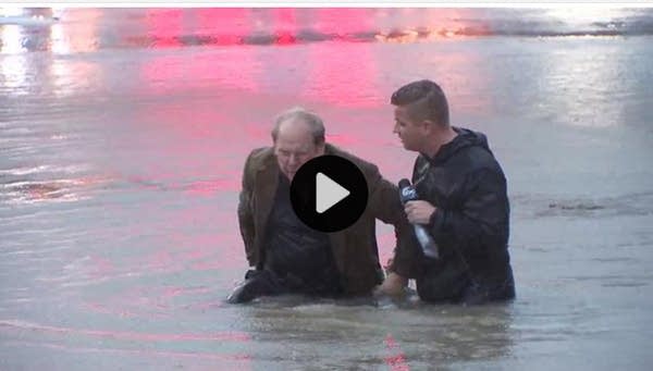 Video: TV reporter rescues man from flood | MPR News