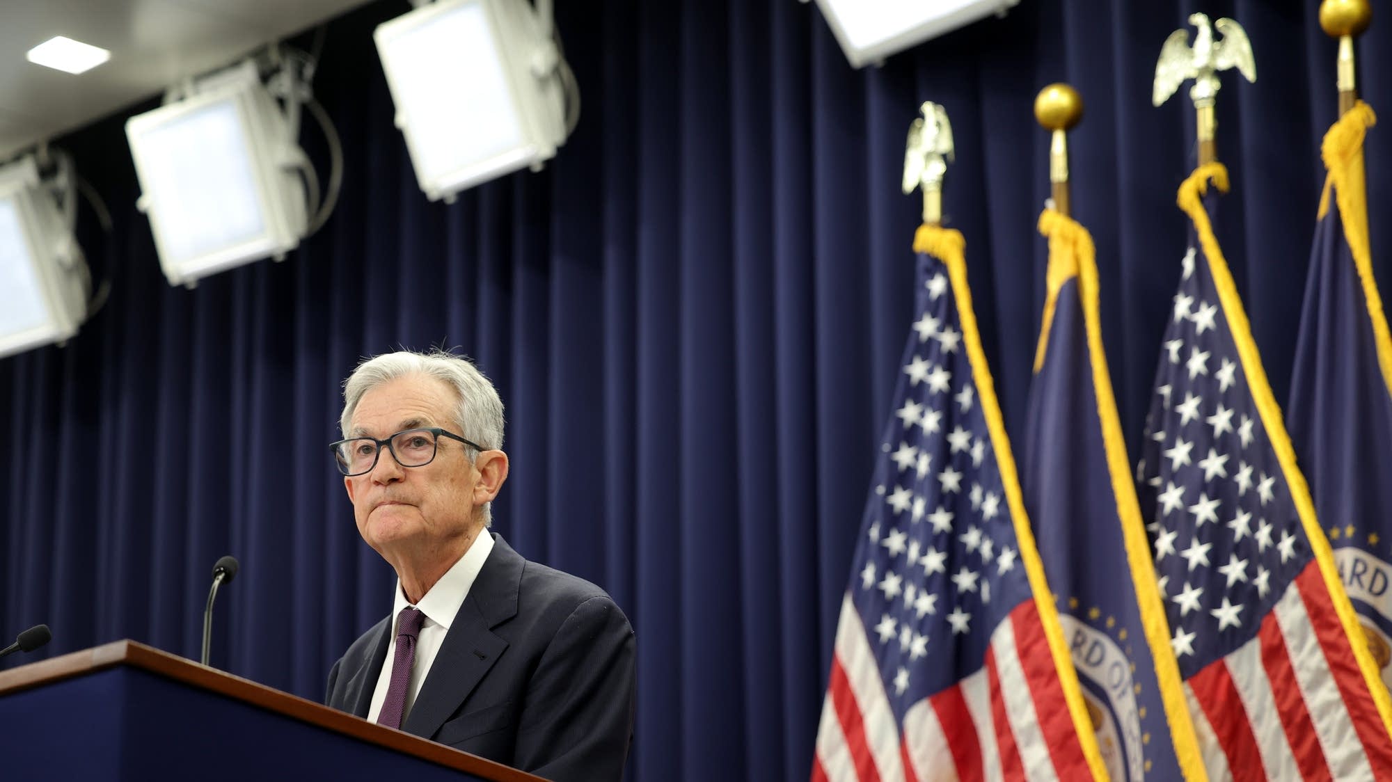 Fed keeps interest rates unchanged, despite pressure from Trump