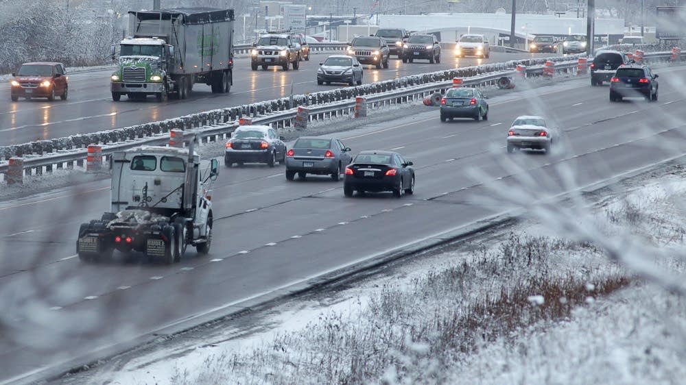 Heavy, wet snow creates slippery road conditions | MPR News