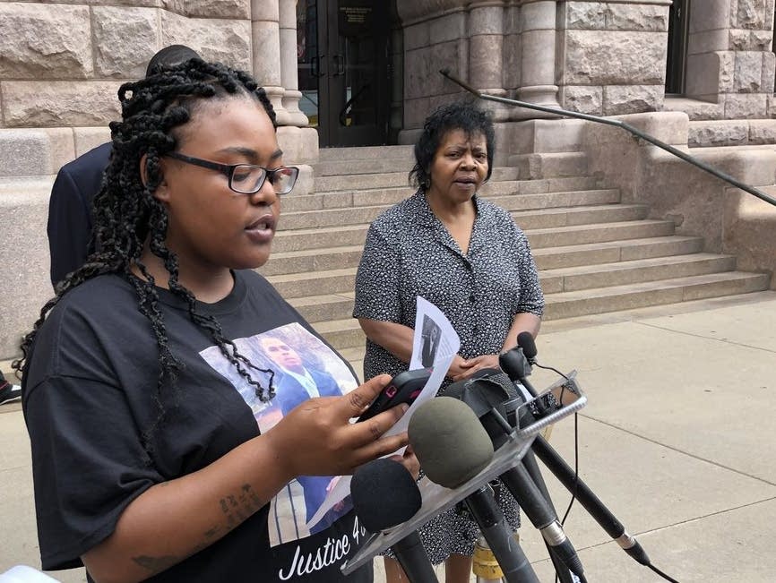 Activists, family demand charges for 2 Minneapolis officers | MPR News