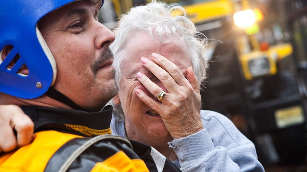 Photos: Storm victims and first responders venture out | MPR News