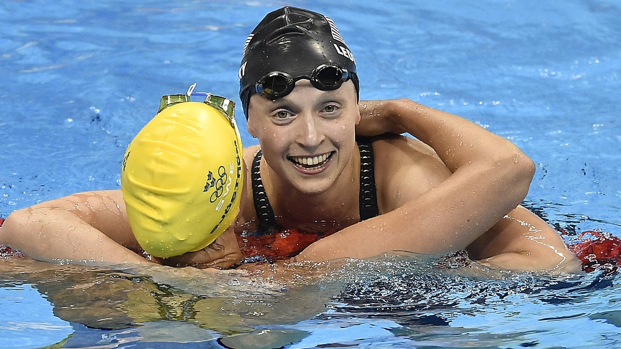 After winning gold, a swimmer shows the heart of a champion | MPR News