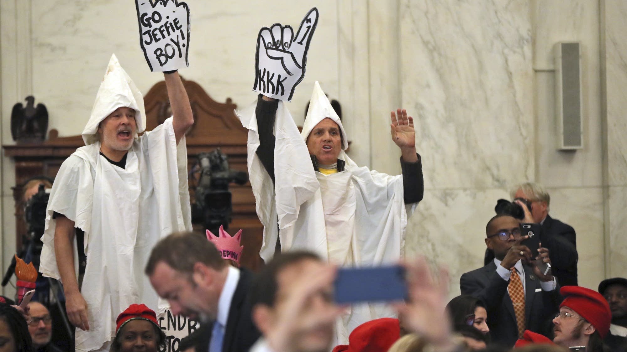 Men in KKK costumes disrupt Sessions' confirmation hearing | MPR News