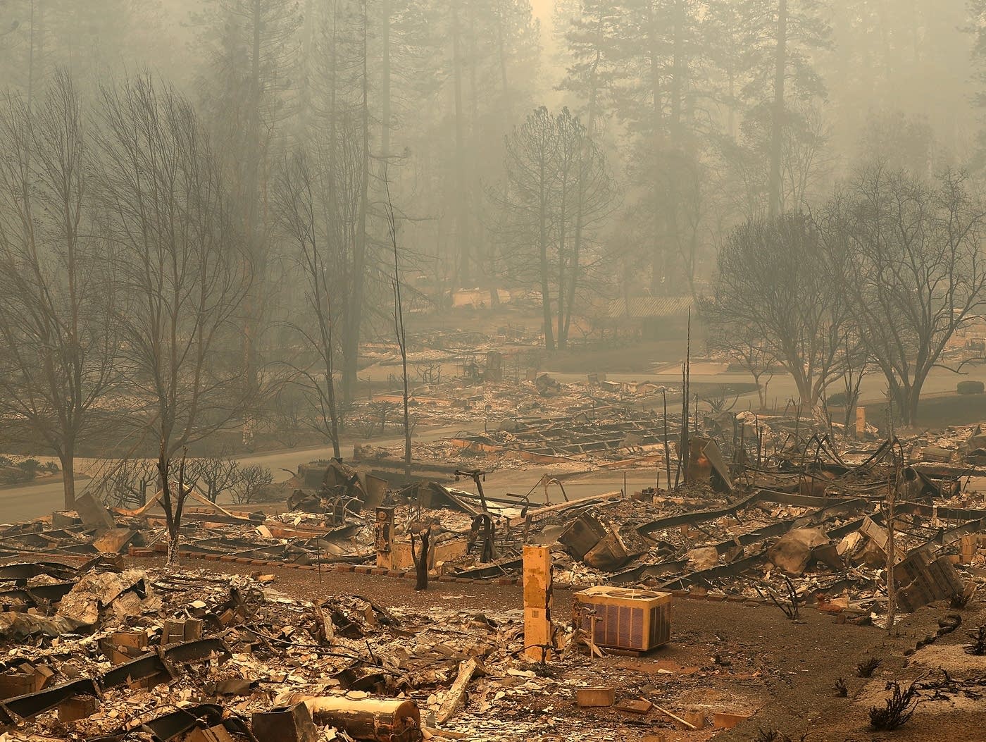 Northern California fire officials begin agonizing search for dead ...
