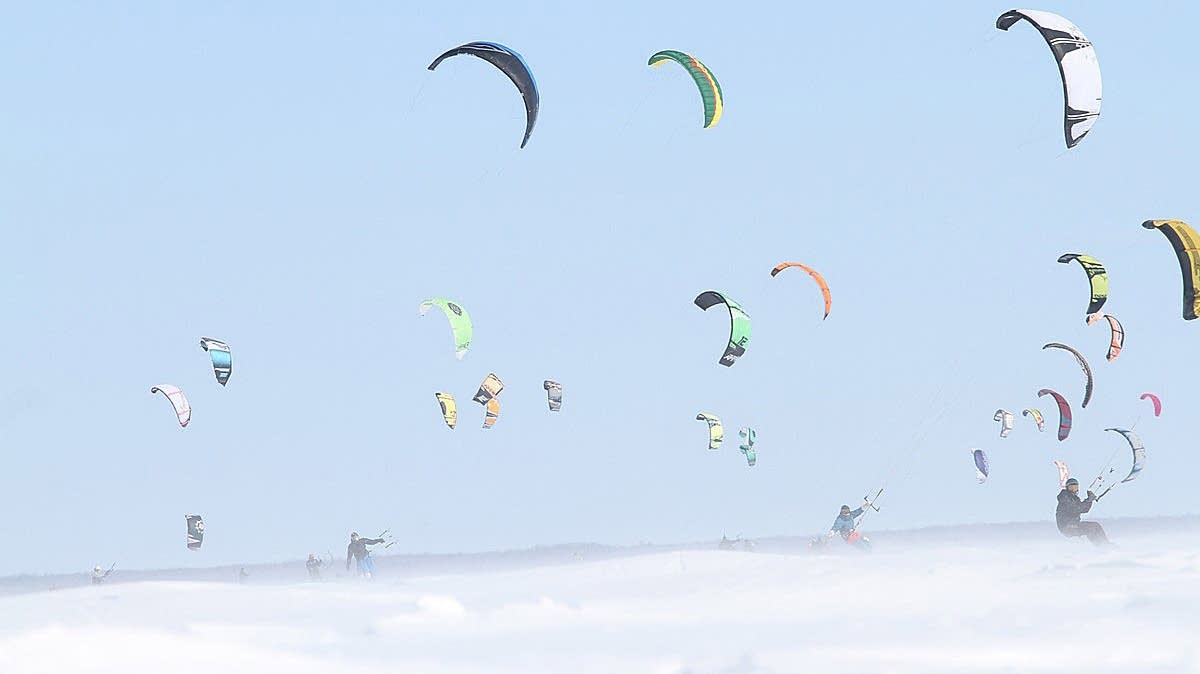 On skis and snowboards, powered by wind, racers cross frozen Mille Lacs ...