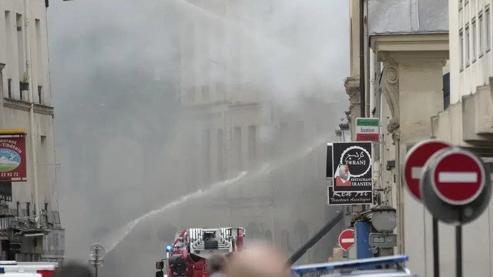 Explosion hits a building in Paris, injuring 16. Police are trying to ...