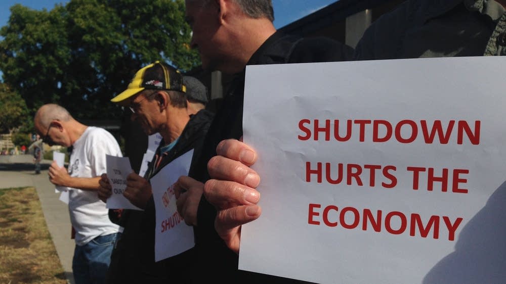 Obama supporters demonstrate outside shuttered federal office | MPR News