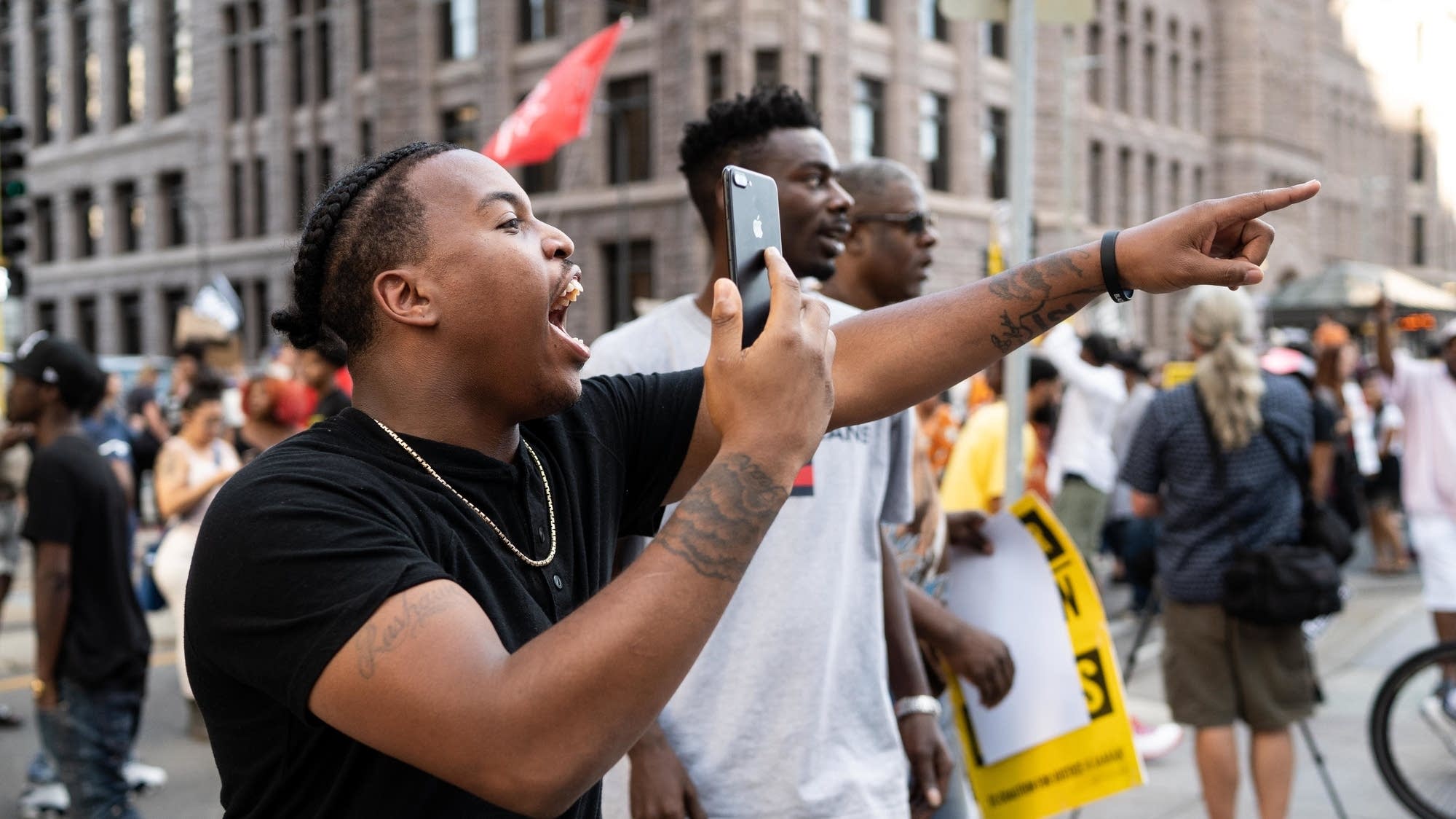 Activists block trains, protest Minneapolis police shooting | MPR News
