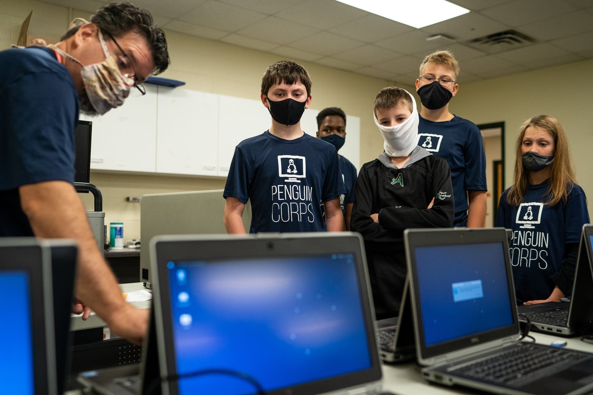 Students step in to refurbish computers as school needs rise | MPR News