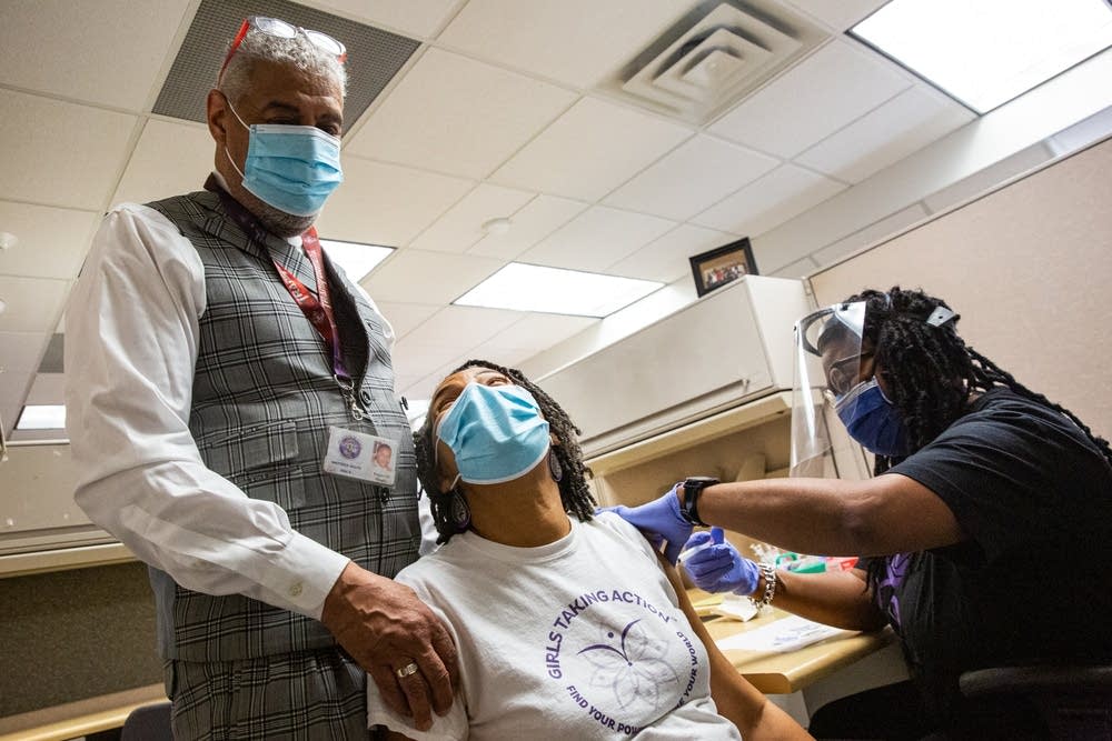 Black nurse volunteers give shots to Minnesota's most vulnerable | MPR News