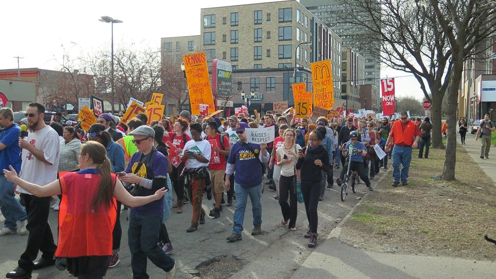 Low-wage workers, supporters rally for $15-an-hour pay | MPR News