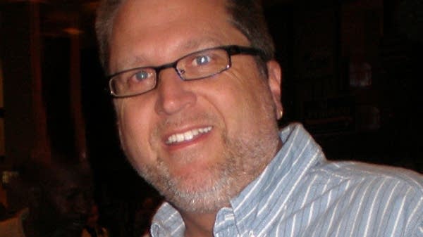 A legendary coach steps down, and a woman takes his place | MPR News