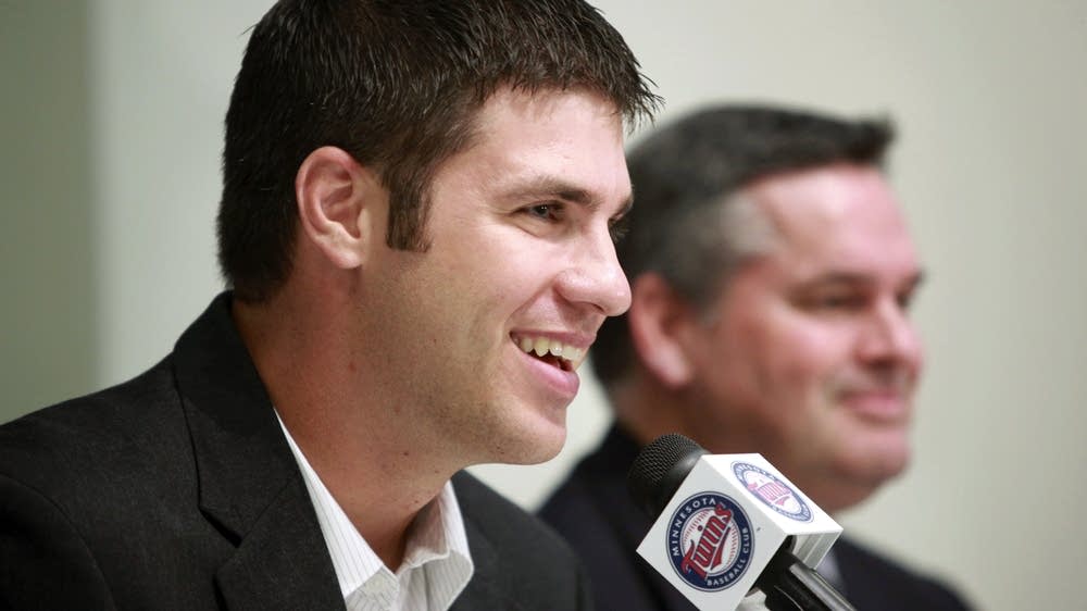 Twins, Mauer make it official: $184M extension and eight more years ...