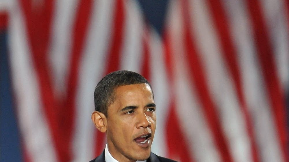 Obama sweeps to victory as first black president | MPR News