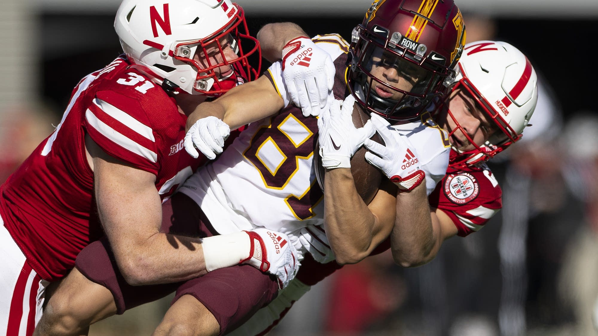 Slow-starting Gophers rally in 2nd half, beat Huskers 20-13 | MPR News