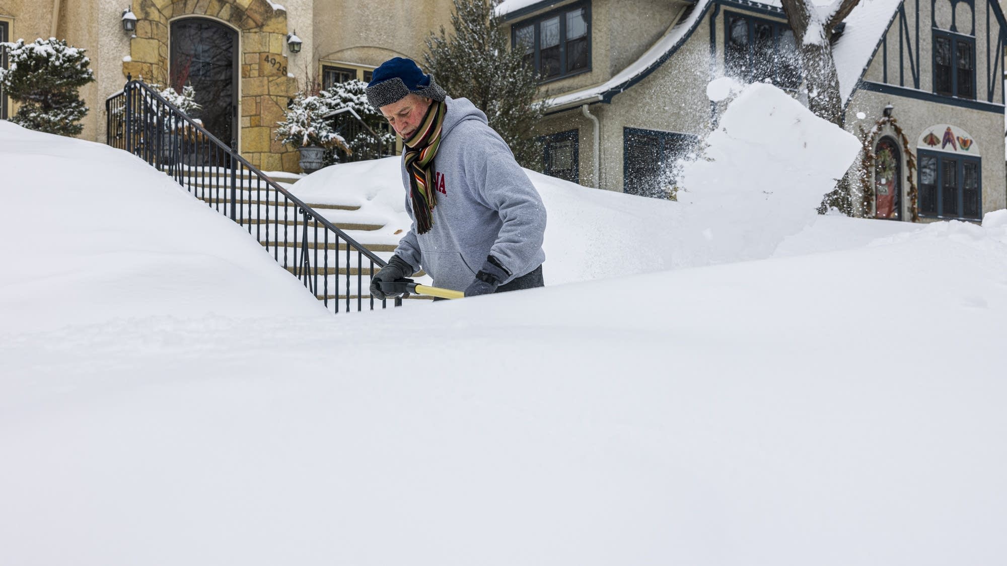 Record snowstorm poses challenges for travel and parking | MPR News
