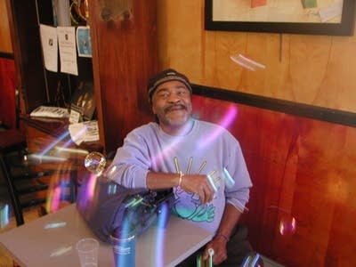 Black voters say issues draw them to Obama | MPR News