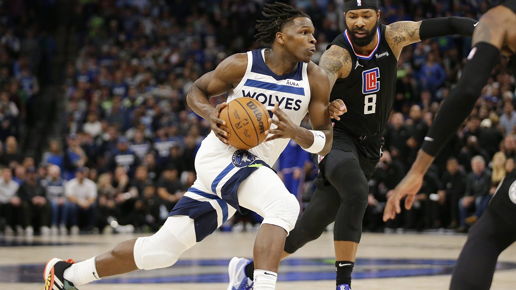Edwards, Russell carry Wolves past Clippers in play-in game | MPR News