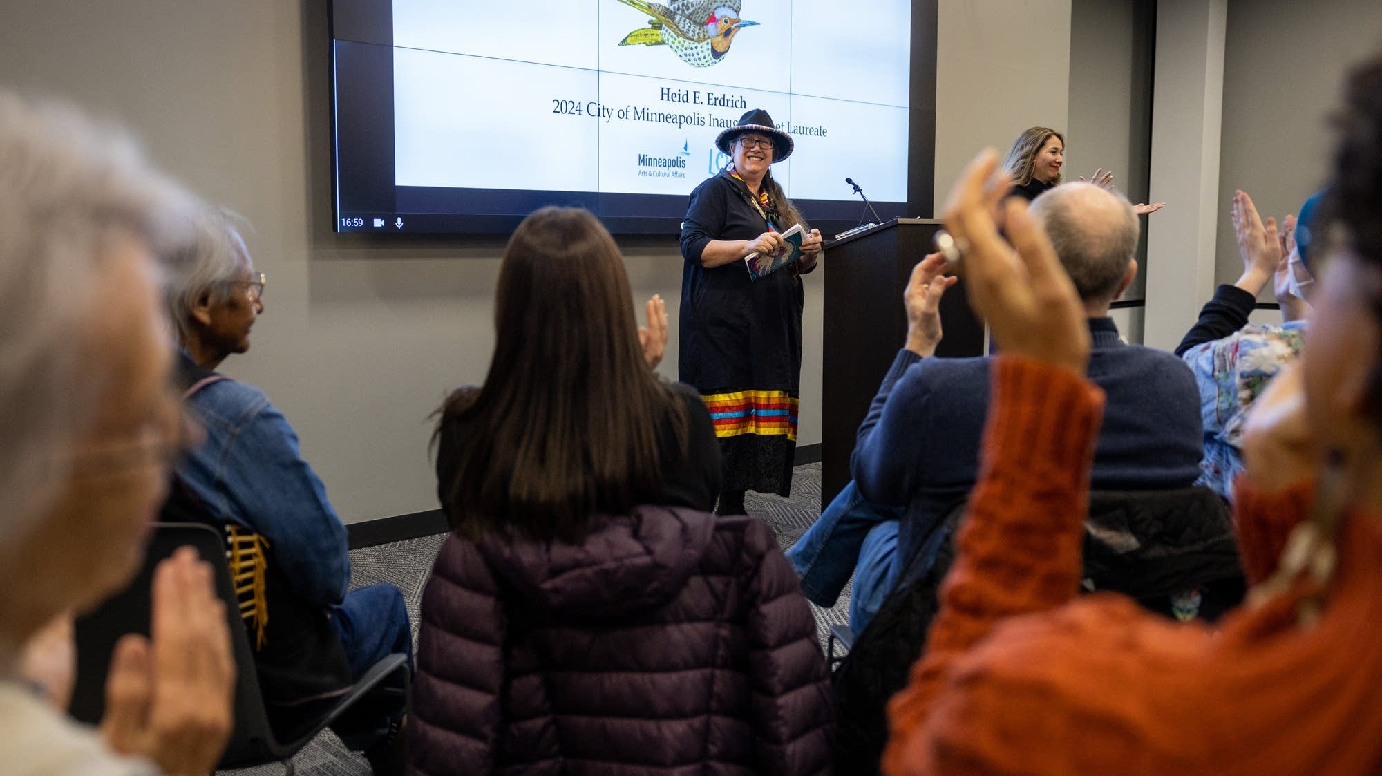 Minneapolis poet laureate Heid E. Erdrich presents official poem to the ...