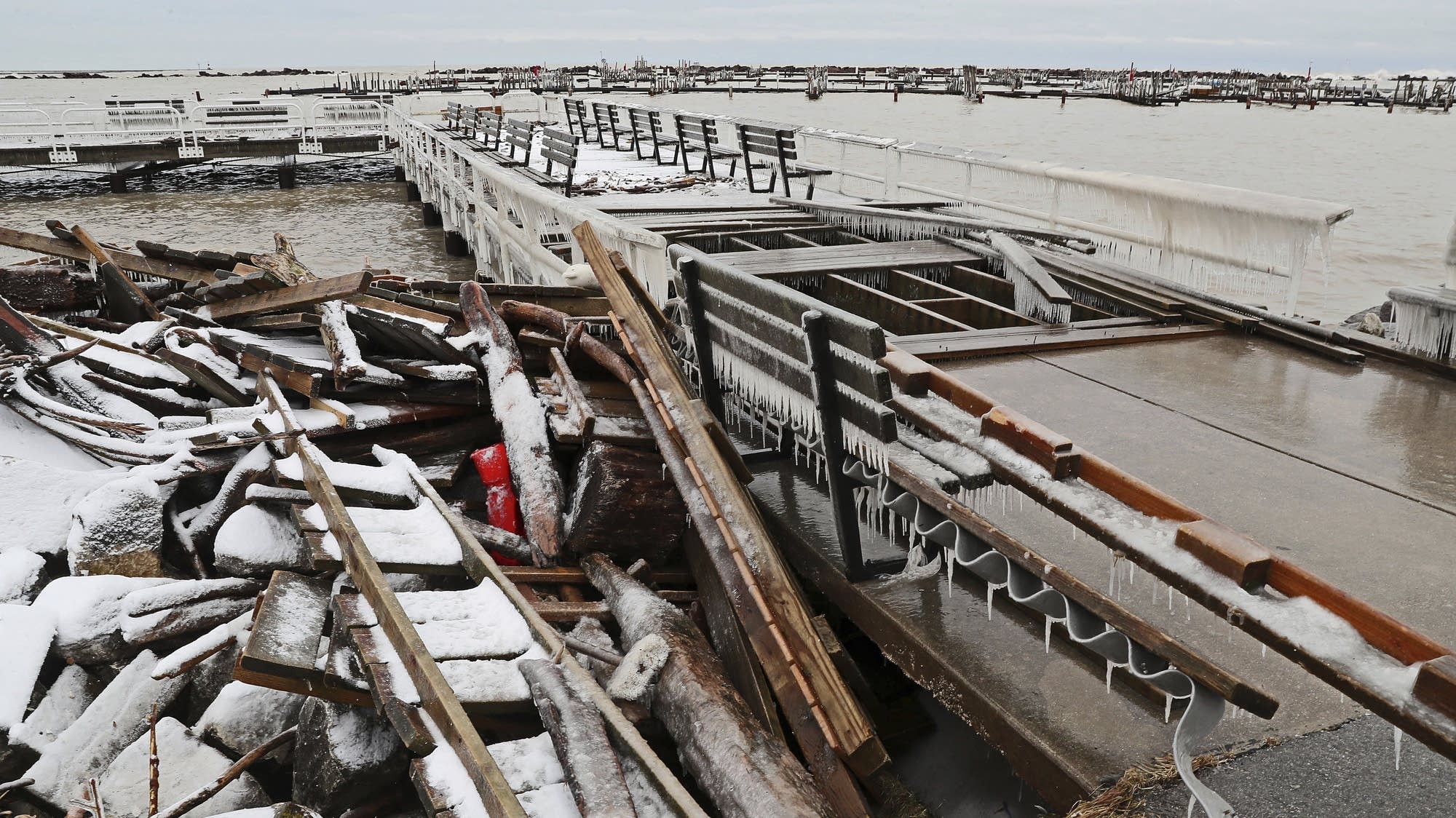 High winds, flooding cause major damage along Lake Michigan shore in ...