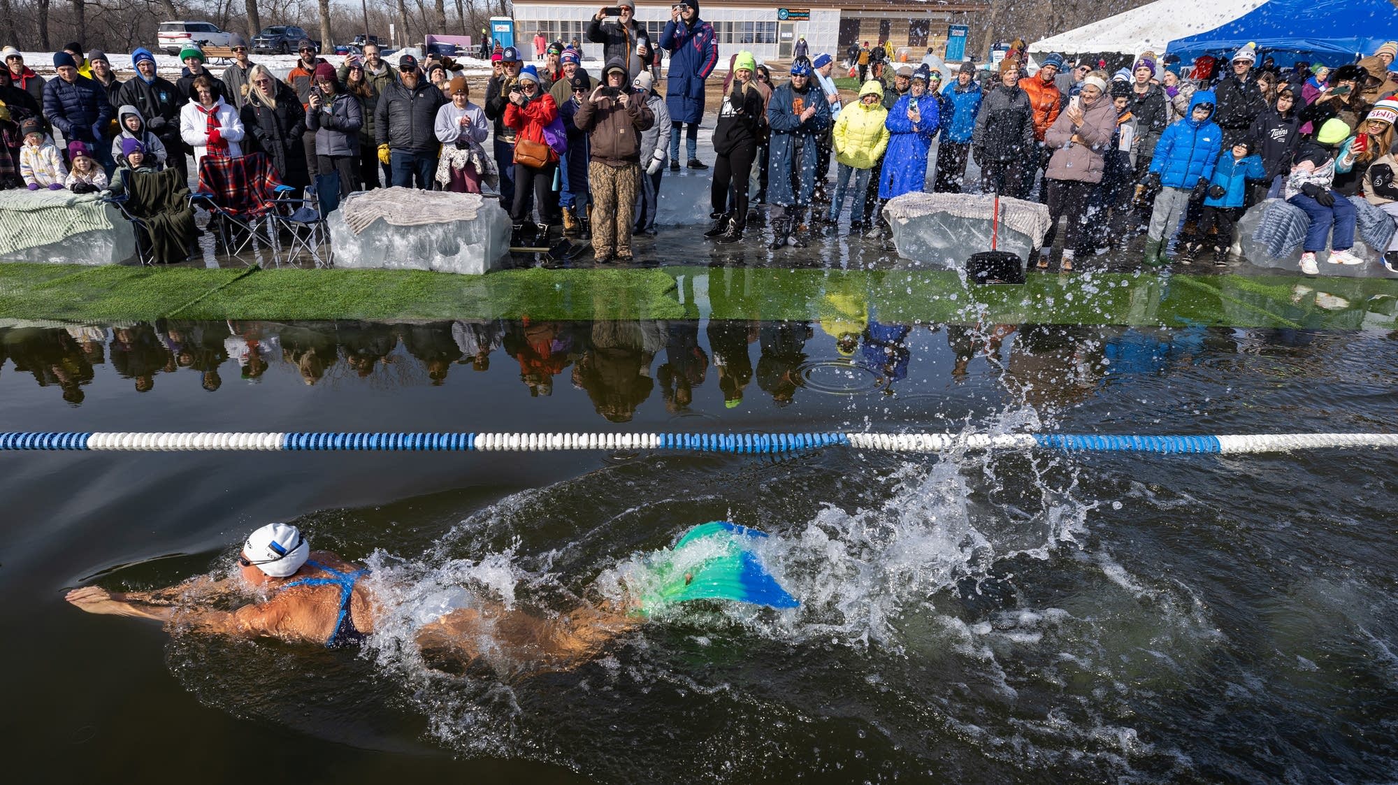 Competitive ice swimming competition at Lake Johanna | MPR News