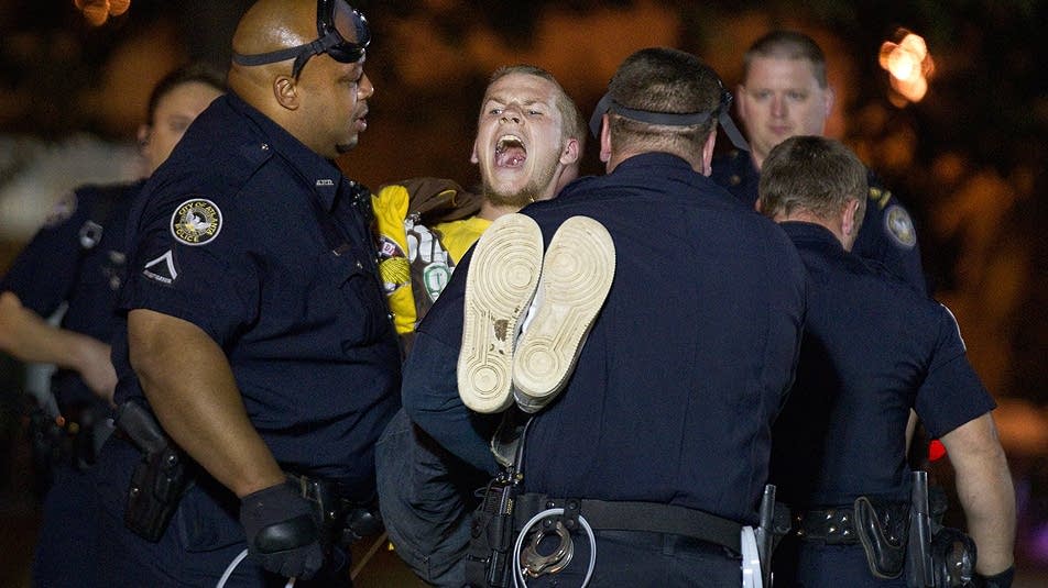 Riot squads clear anti-Wall Street protests in 2 cities | MPR News