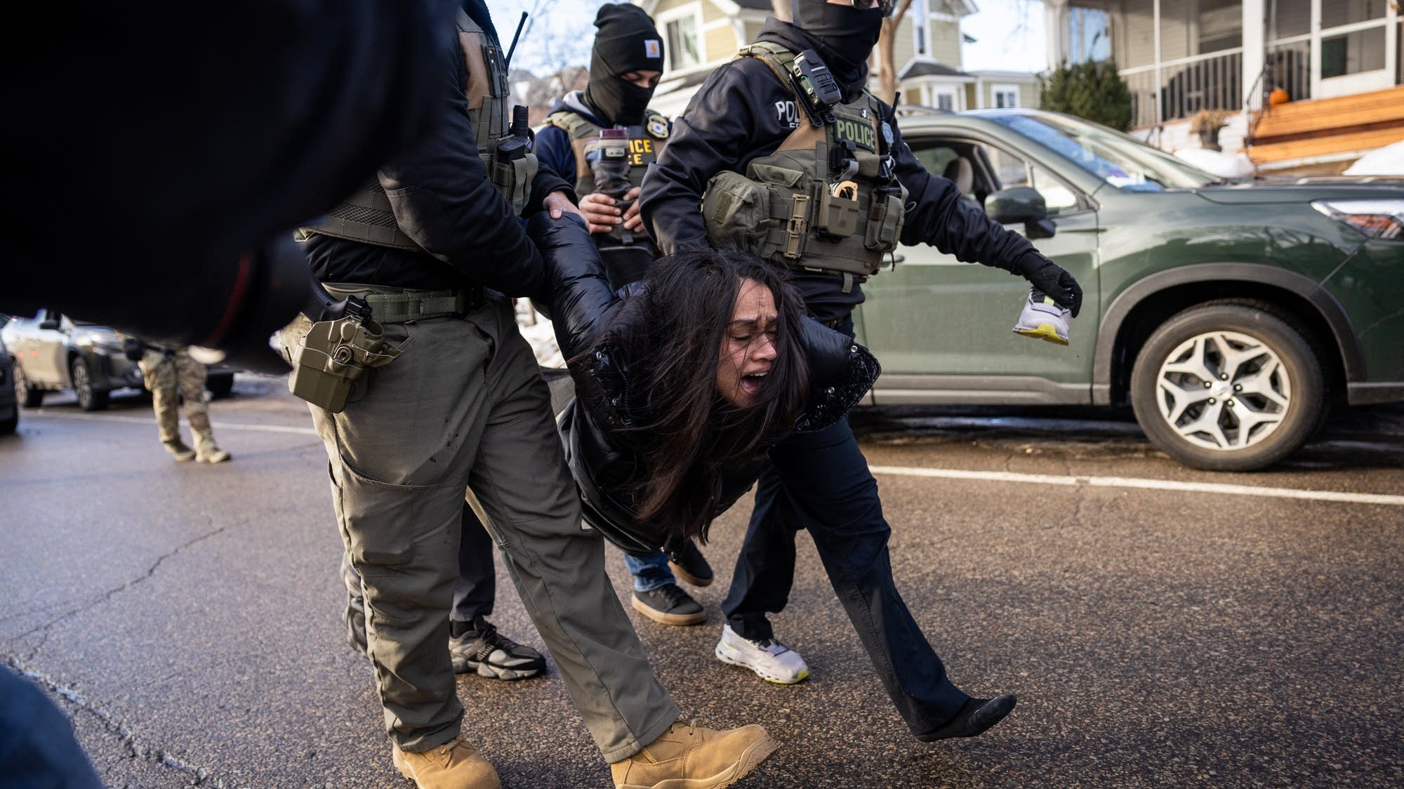 Woman dragged from car by feds files legal action - MinnMix