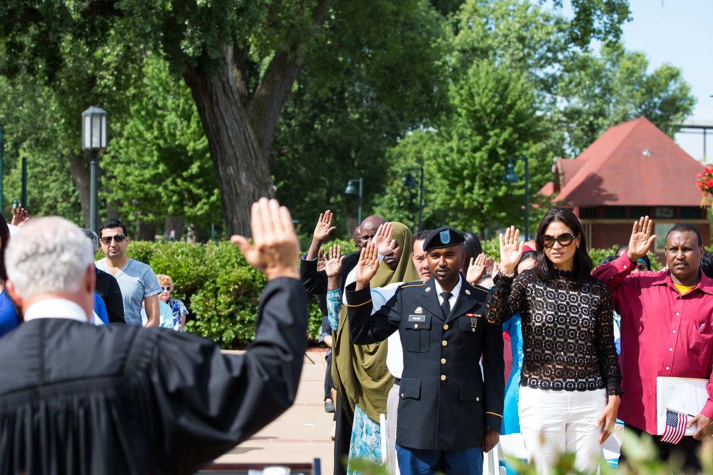 Dozens of new immigrants become U.S. citizens at Harriet Island ...