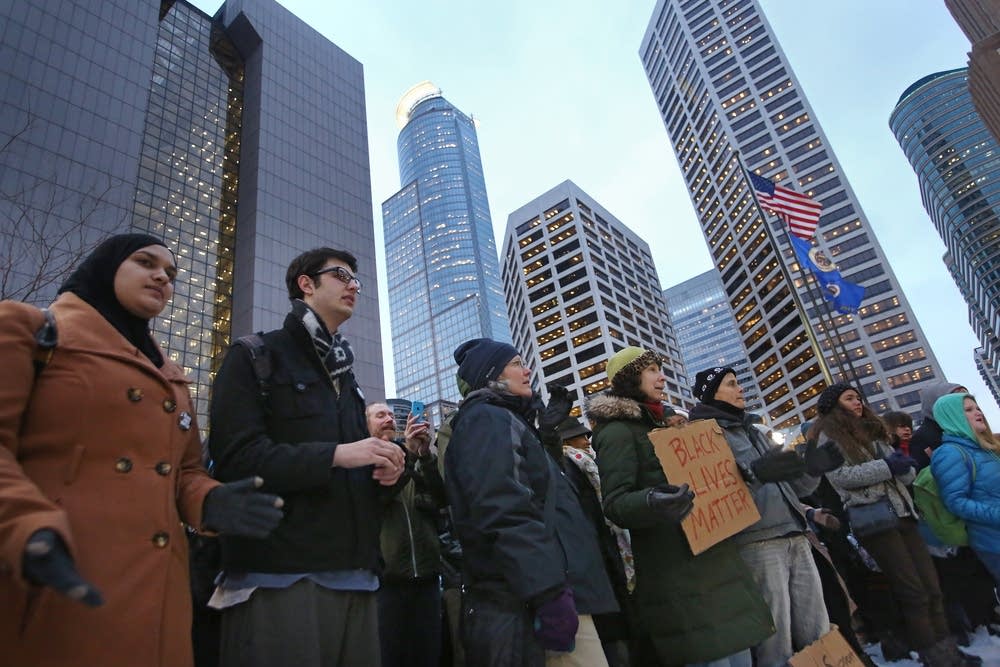 Policing, economic concerns keep protesters at 4th Precinct | MPR News