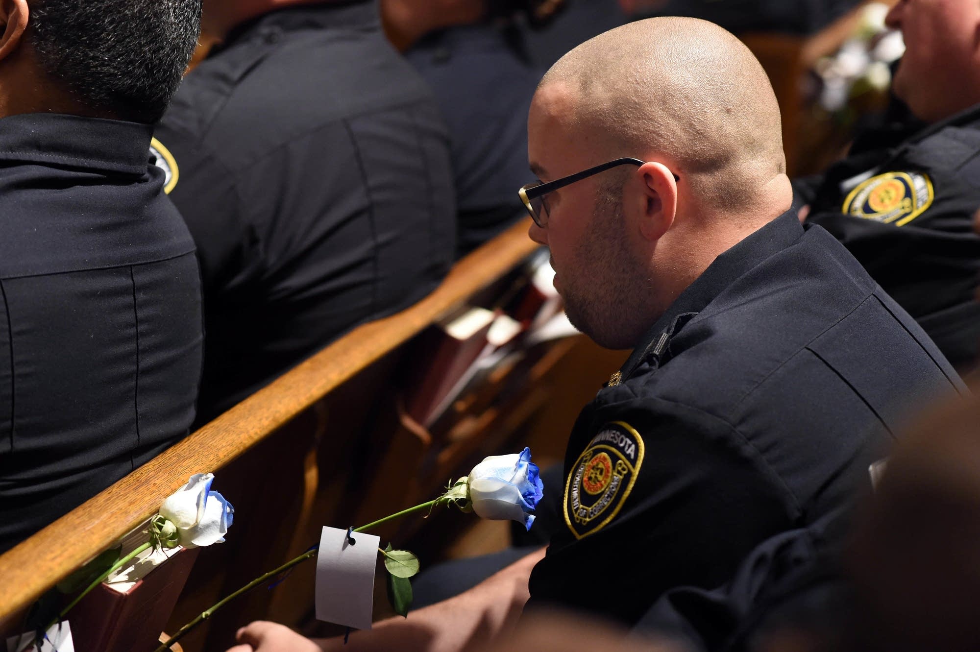 Prison officer's funeral draws hundreds to Fort Snelling | MPR News