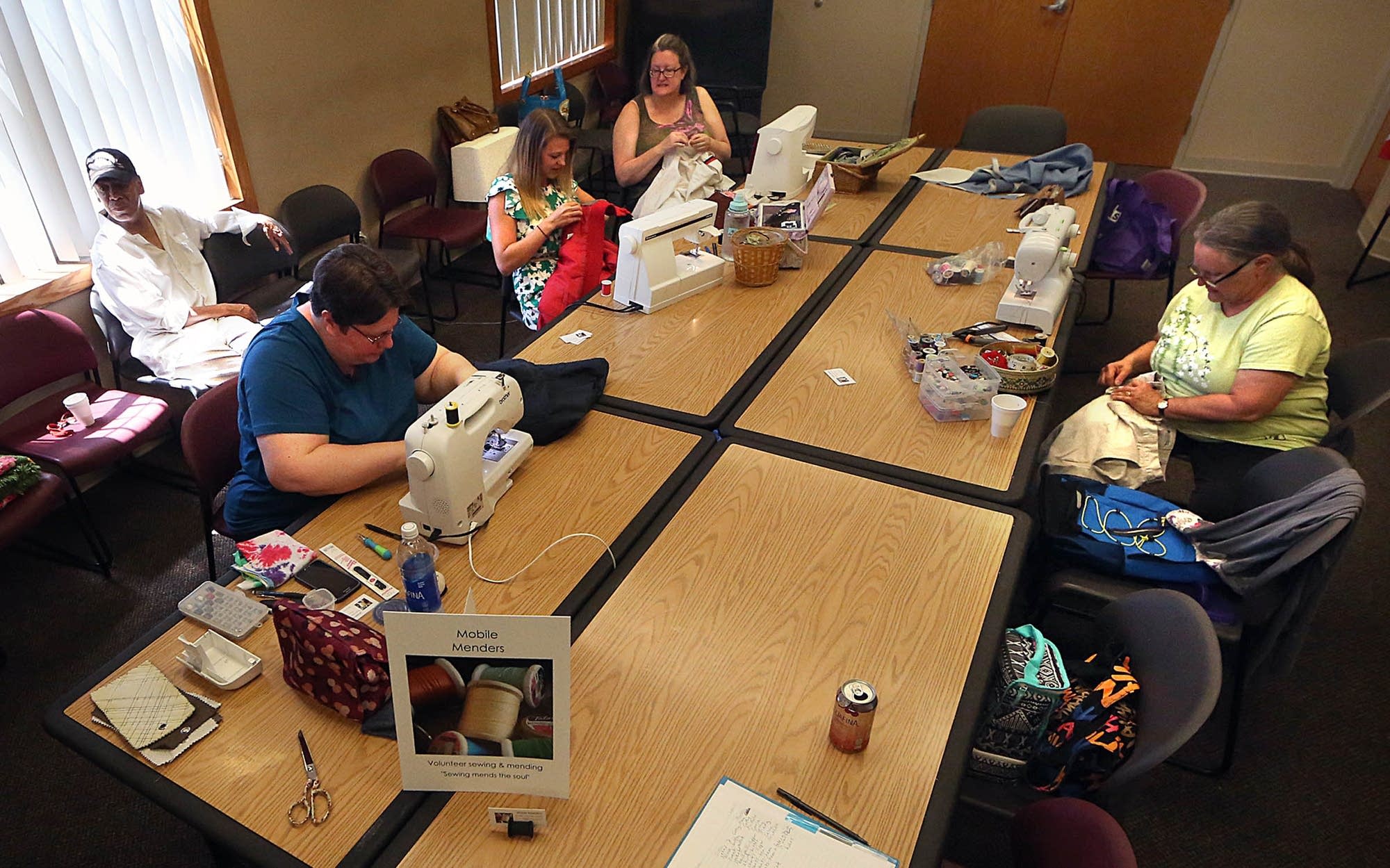 Sewing volunteers mend clothes, hearts and the planet | MPR News