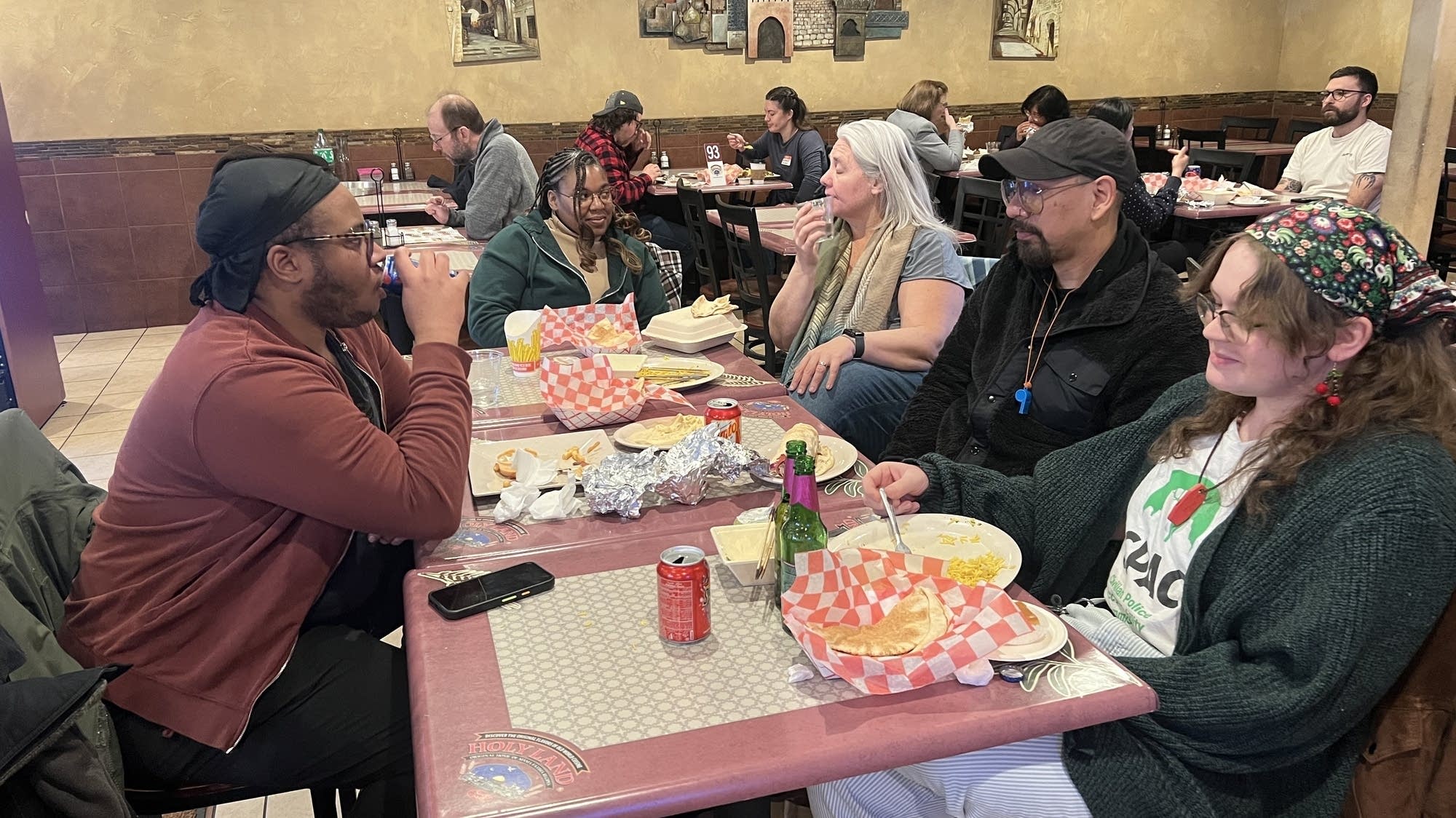 Dozens rally at immigrant-owned restaurants in Minneapolis for 'dine-in ...